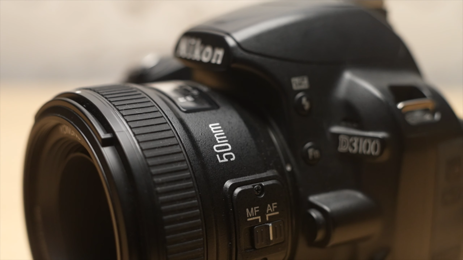 How to Use a Nikon D3100? - FotoProfy